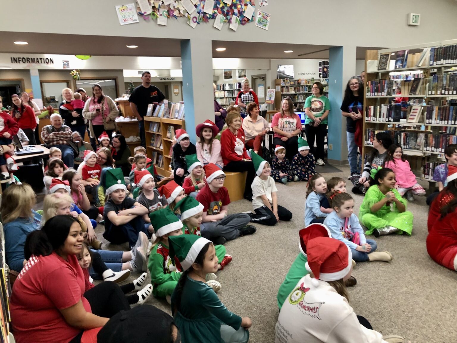 Grinch Christmas Party draws large crowd at Warren Branch Library ...